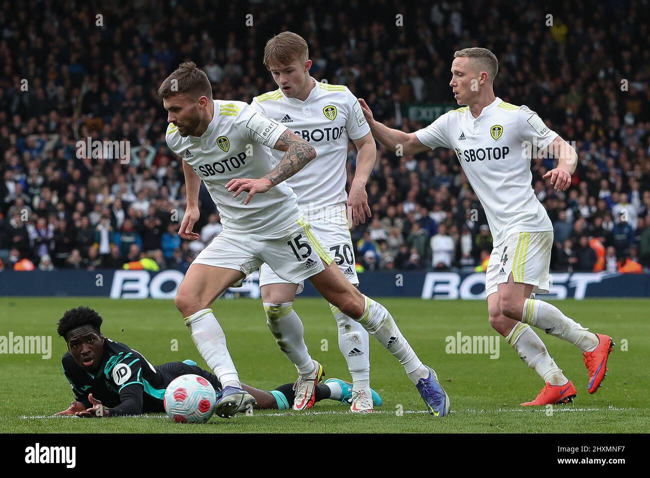 Stuart Dallas #15 of Leeds United, Joe Gelhardt #30 of Leeds United and ...