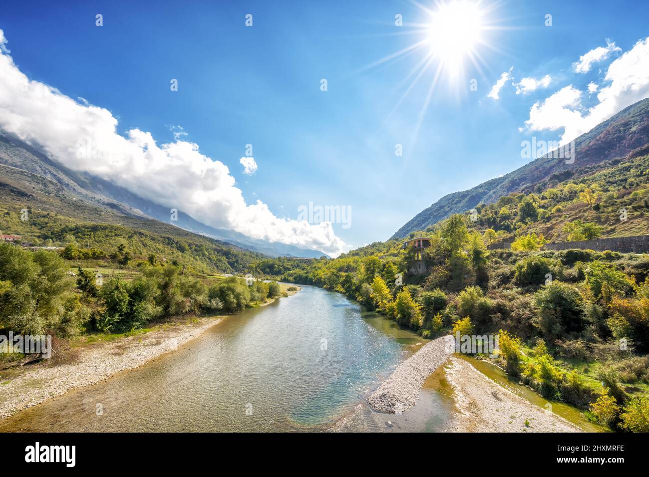 Beautiful mountain valley with gentle hills and river Stock Photo - Alamy