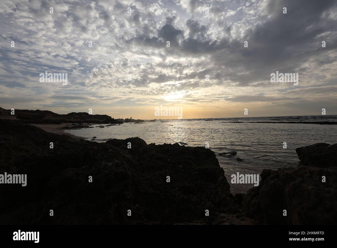 Vivid sunset over ocean with clouds High quality Stock Photo - Alamy