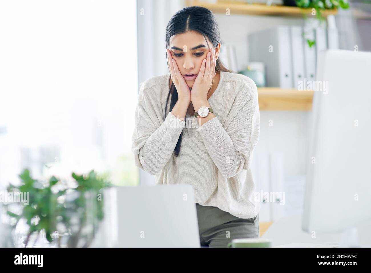 Shocked worried female employee hi-res stock photography and images - Alamy