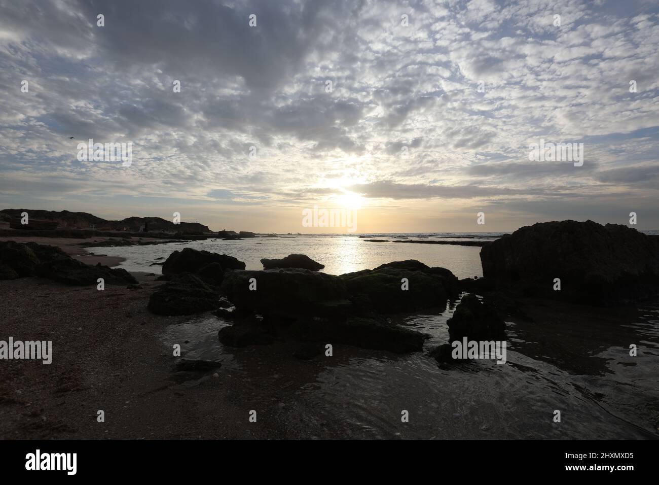Vivid sunset over ocean with clouds High quality Stock Photo - Alamy