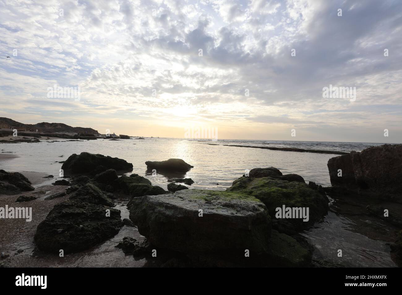 Vivid sunset over ocean with clouds High quality Stock Photo - Alamy