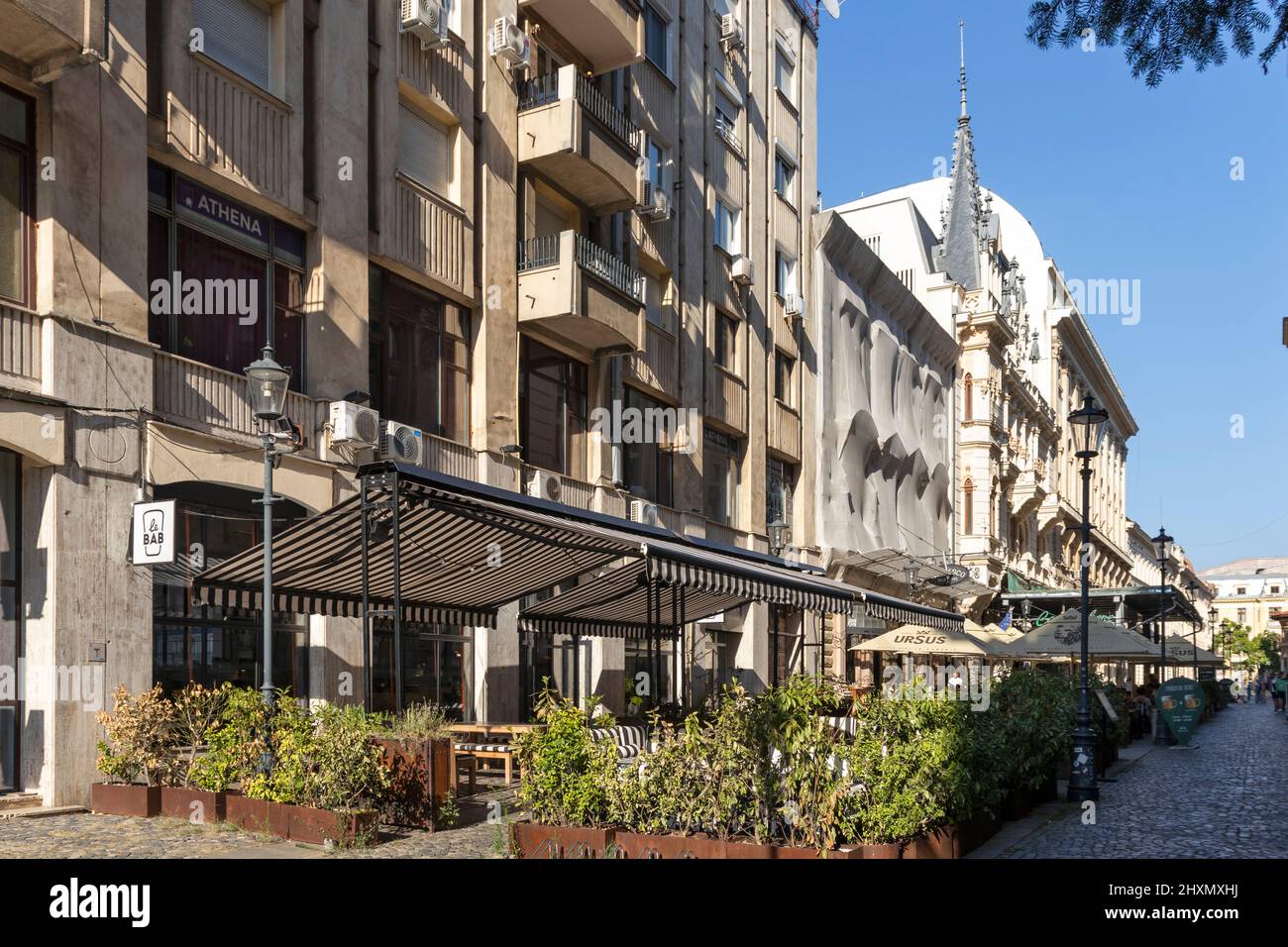 BUCHAREST, ROMANIA - AUGUST 16, 2021: Typical street and building at ...