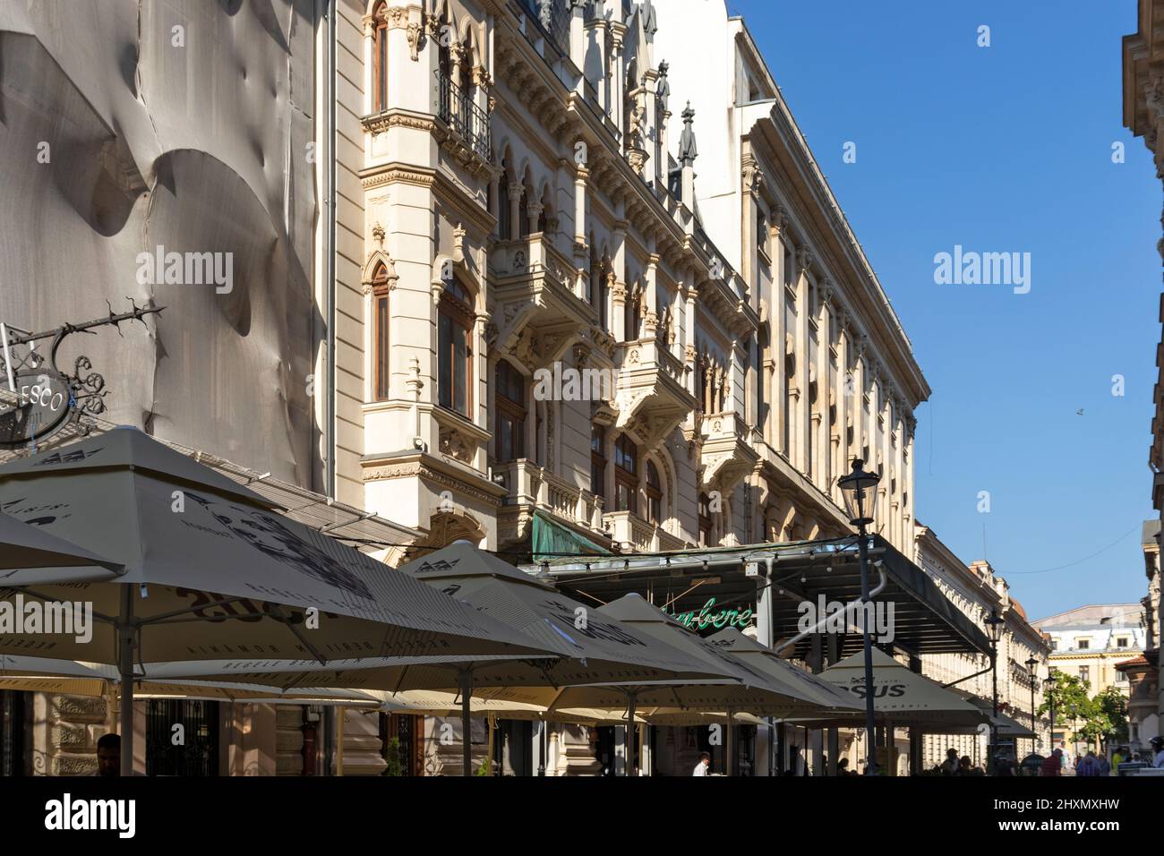 BUCHAREST, ROMANIA - AUGUST 16, 2021: Typical street and building at ...