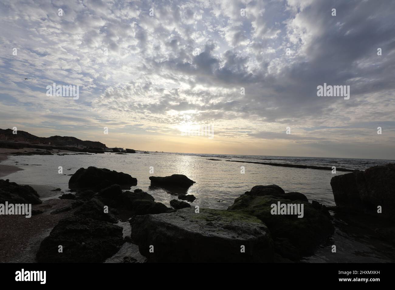 Vivid sunset over ocean with clouds High quality Stock Photo - Alamy