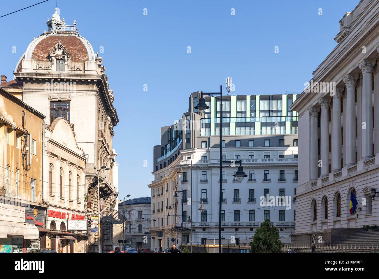 BUCHAREST, ROMANIA - AUGUST 16, 2021: Typical street and building at ...