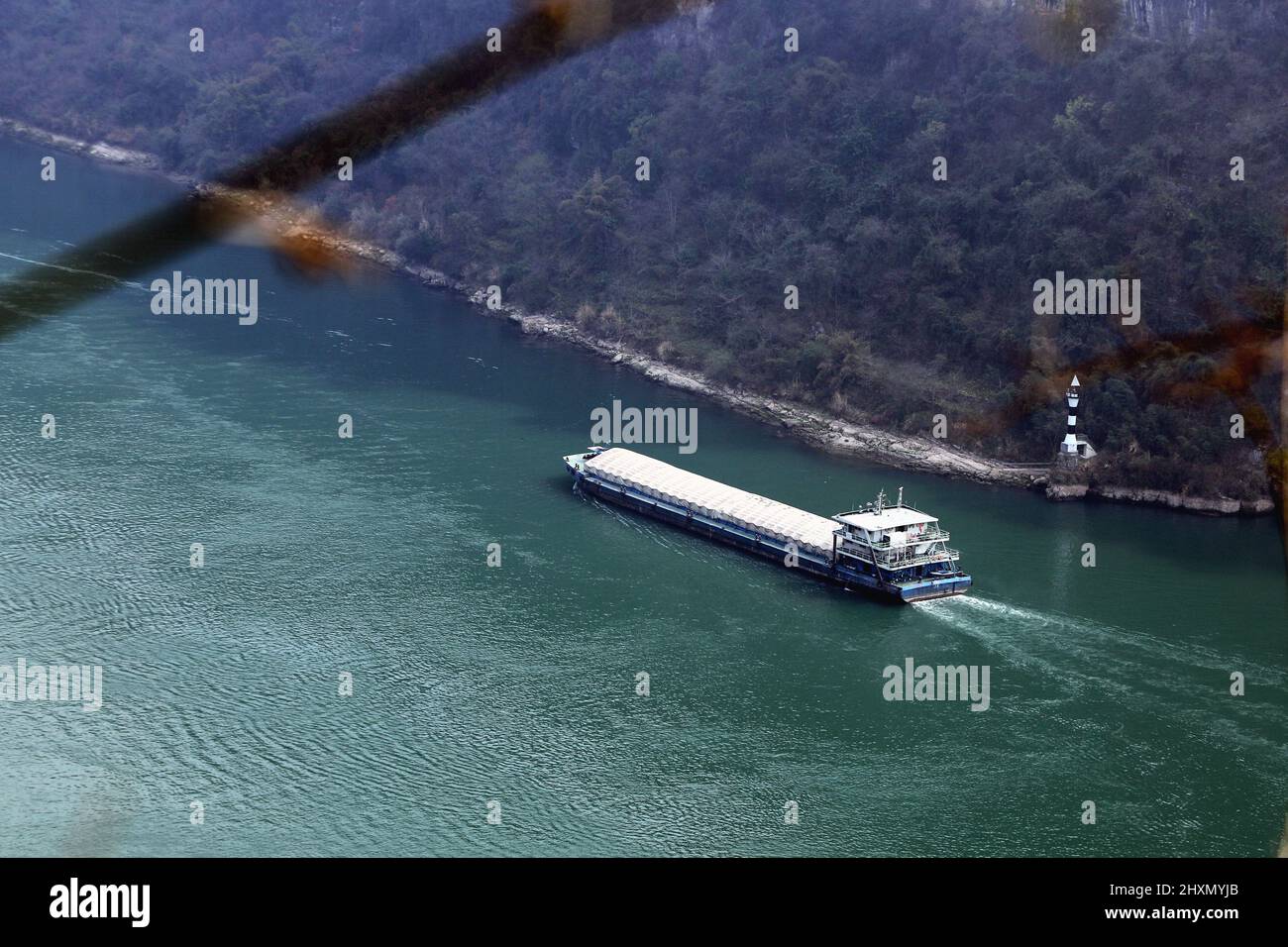 YICHANG, CHINA - MARCH 13, 2022 - Cargo ships shuttle between the Three ...