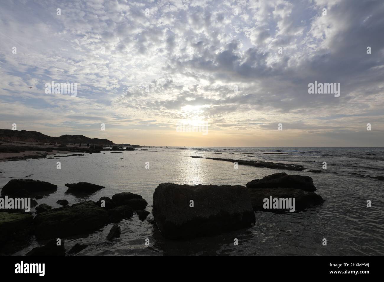 Vivid sunset over ocean with clouds High quality Stock Photo - Alamy