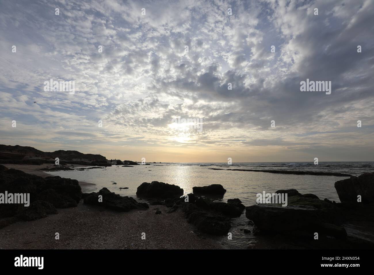 Vivid sunset over ocean with clouds High quality Stock Photo - Alamy