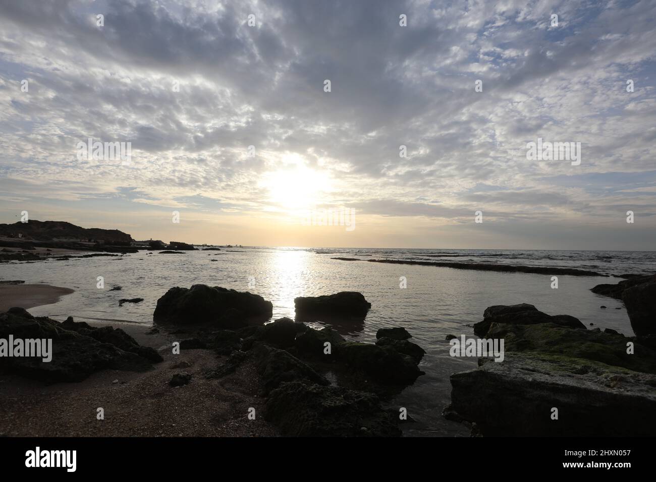 Vivid sunset over ocean with clouds High quality Stock Photo - Alamy
