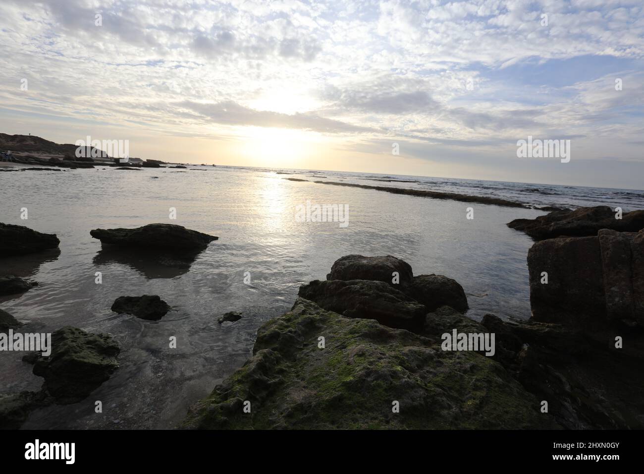 Vivid sunset over ocean with clouds High quality Stock Photo - Alamy