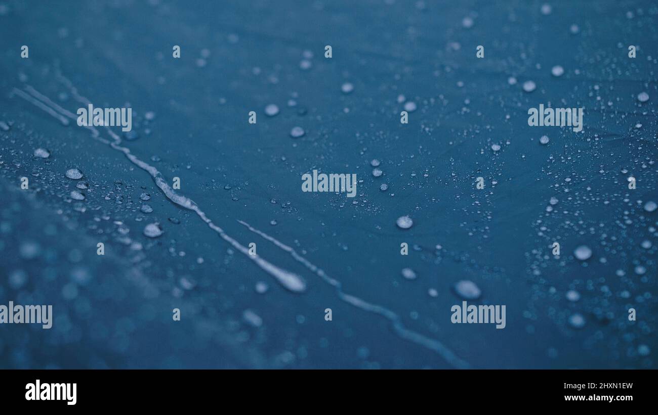 Close-up shot of raindrops water droplets on the tent. Dew drops on ...