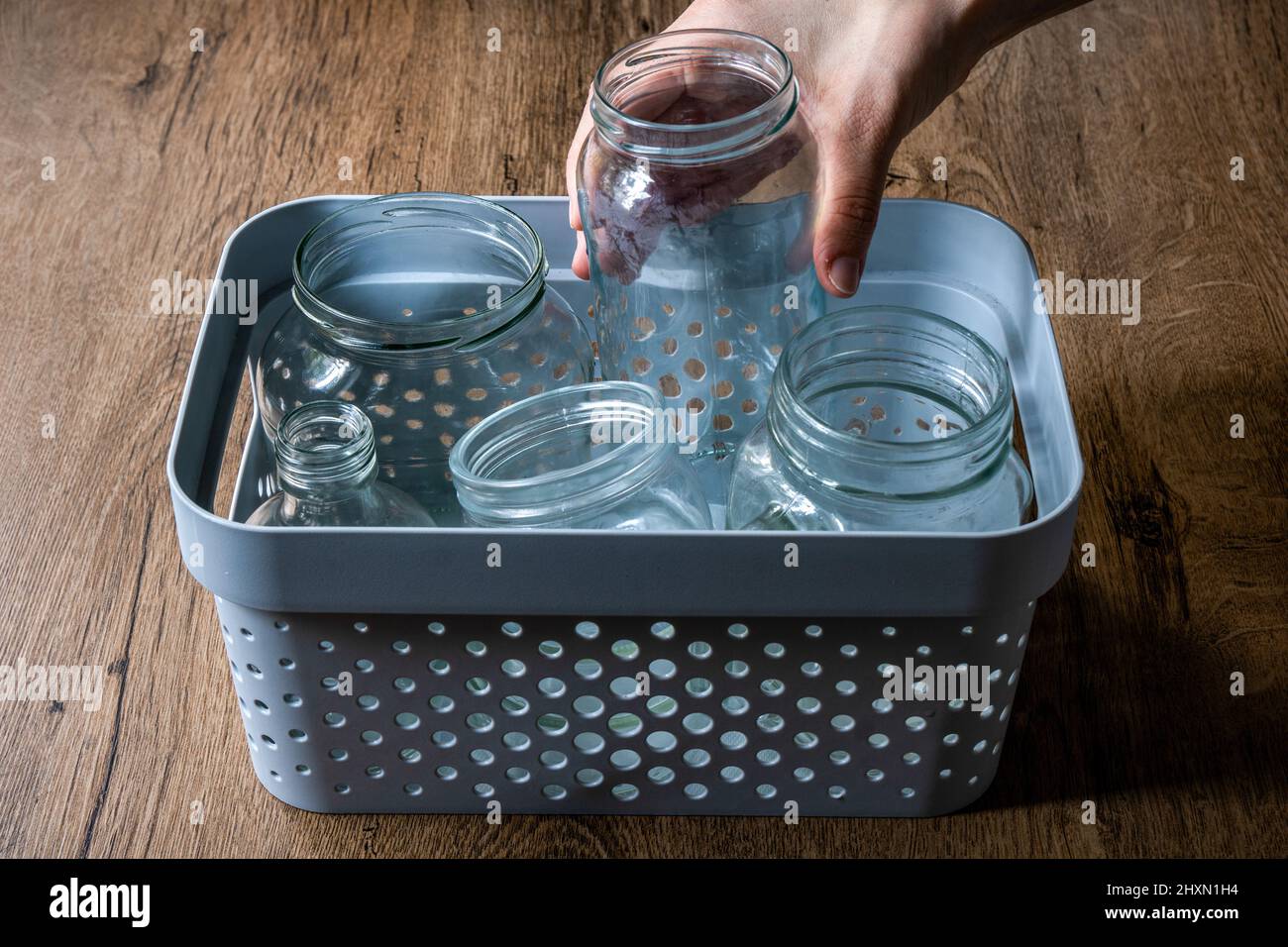 Box filled with glass jars and bottles for recycling Stock Photo - Alamy