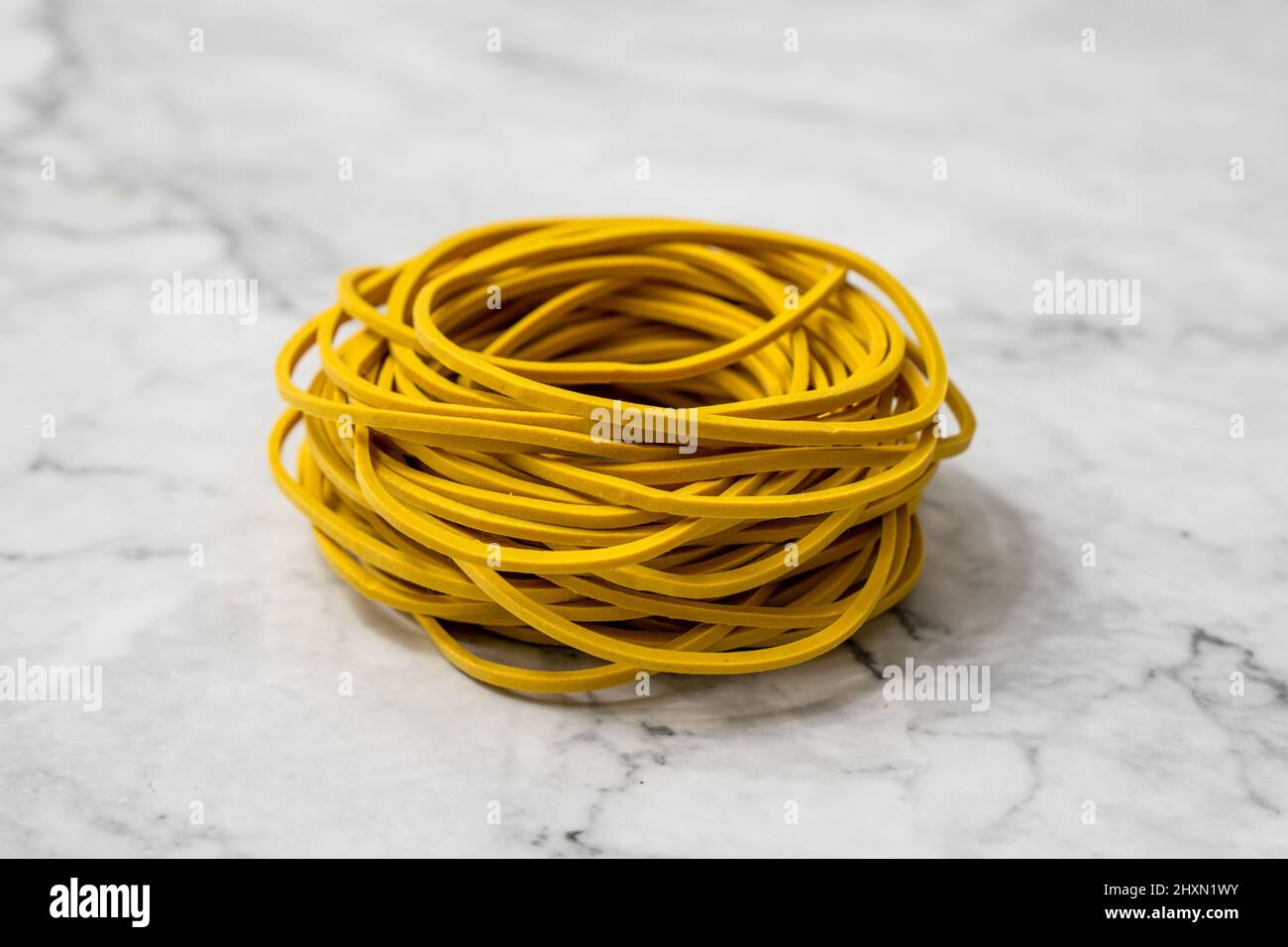 Stack of rubber bands hi-res stock photography and images - Alamy