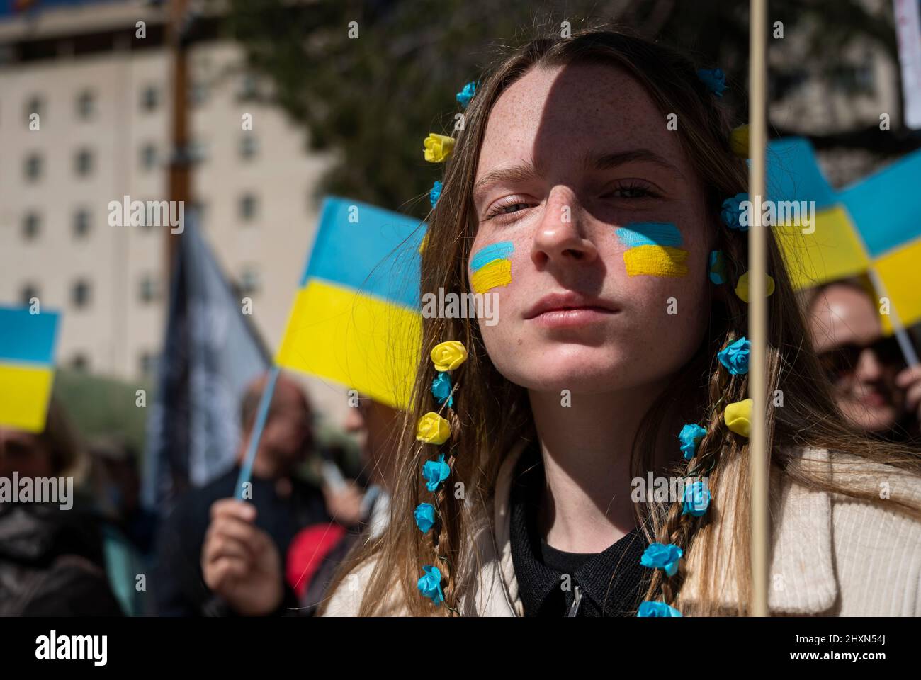 Madrid, Spain, - 13 Mar 2022, A protester seen wearing blue and yellow ...