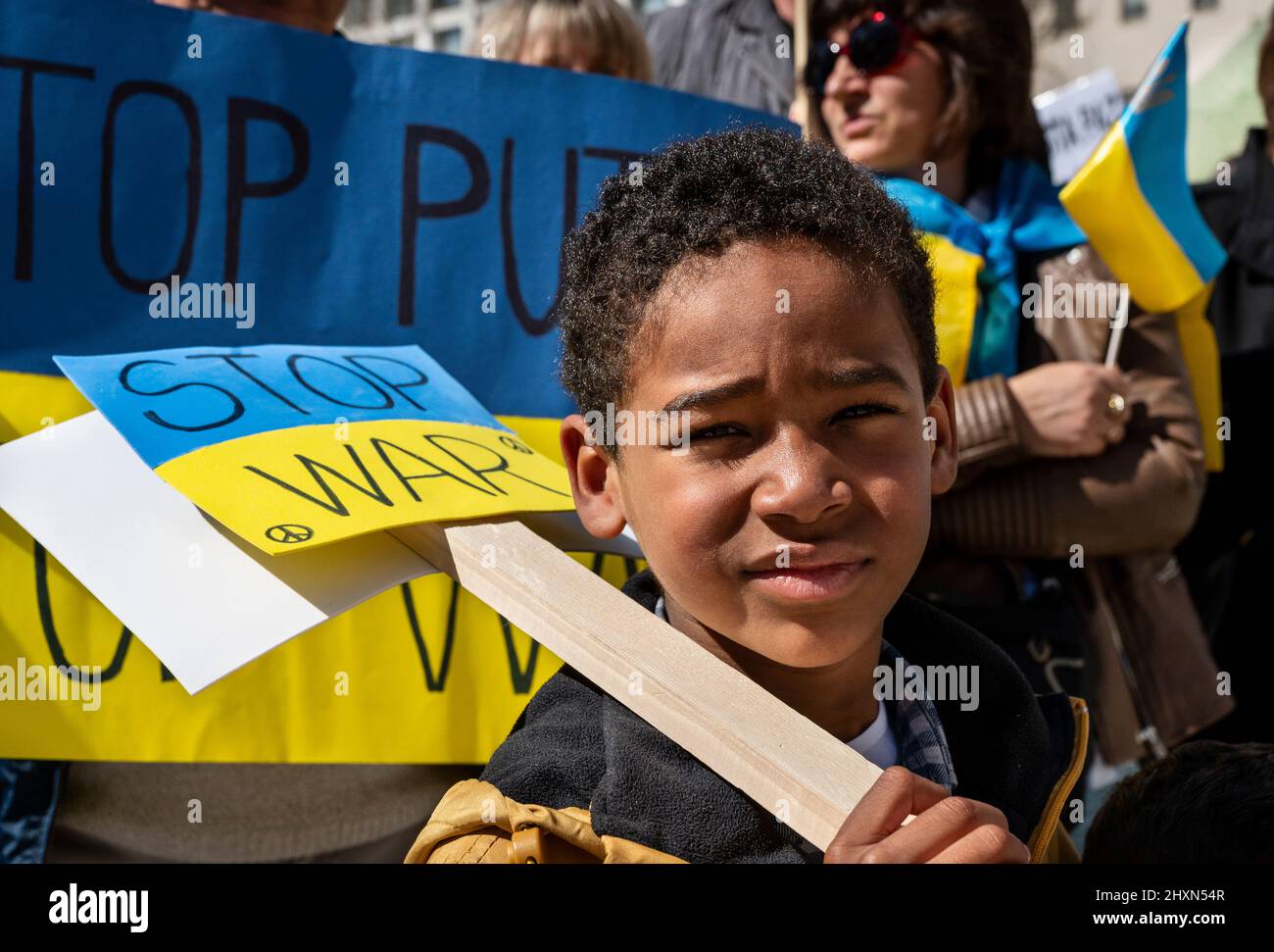 Madrid, Spain. 13th Mar, 2022. A child holds a placard with the message ...