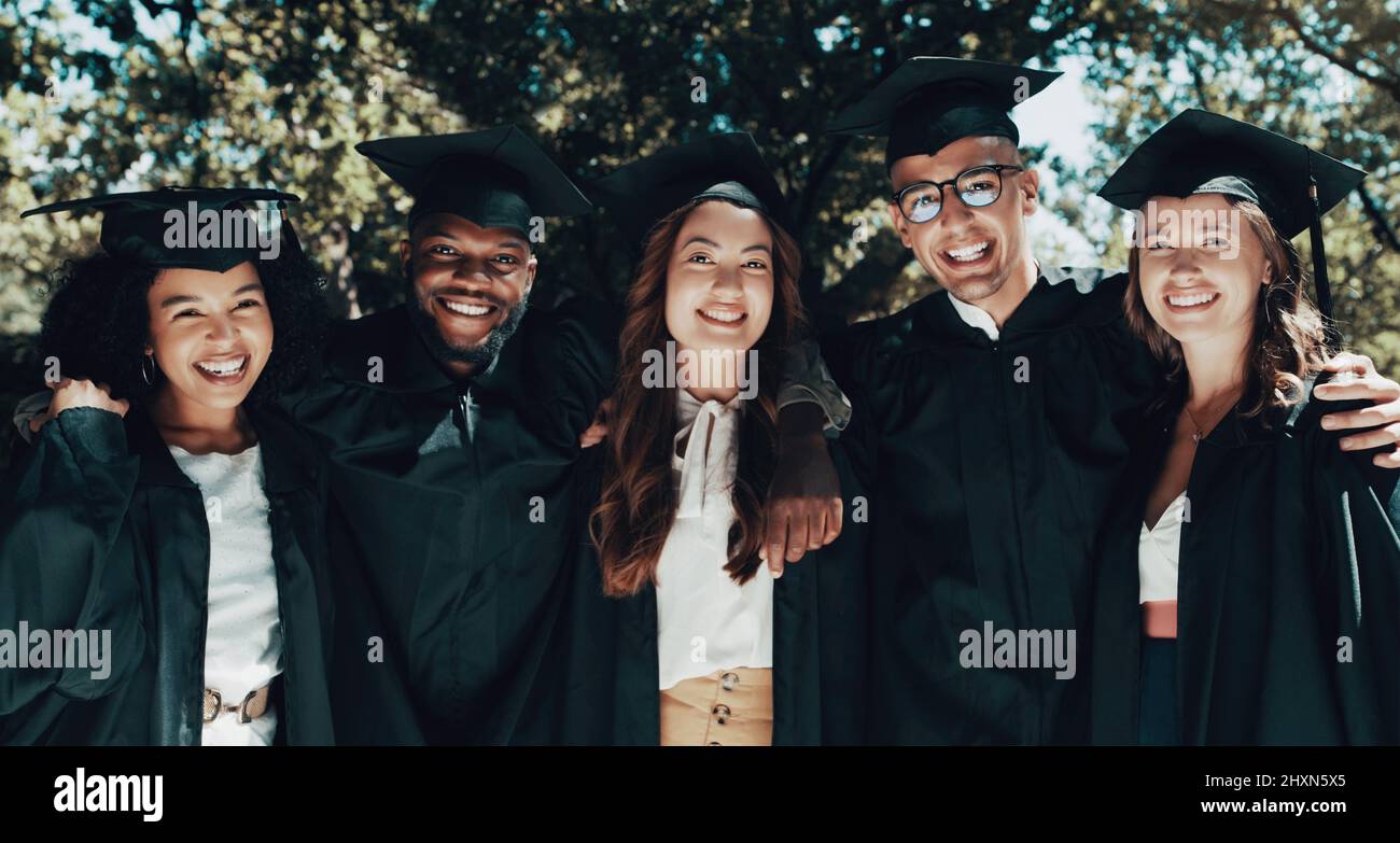 The day is finally here. Shot of a group of students standing together ...