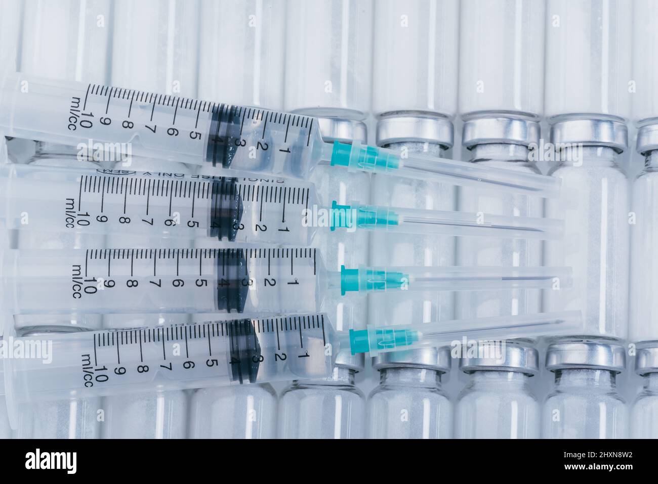 Medicine, Injection, vaccine and disposable syringe, drug concept ...