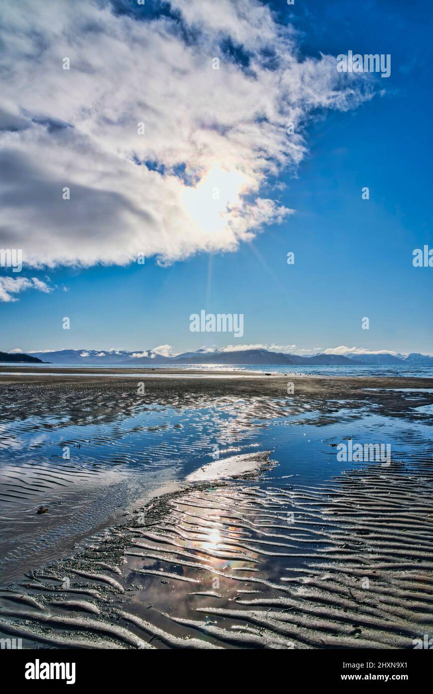 Sand patterns on a beach in Southeast Alaska on a sunny day at low tide ...