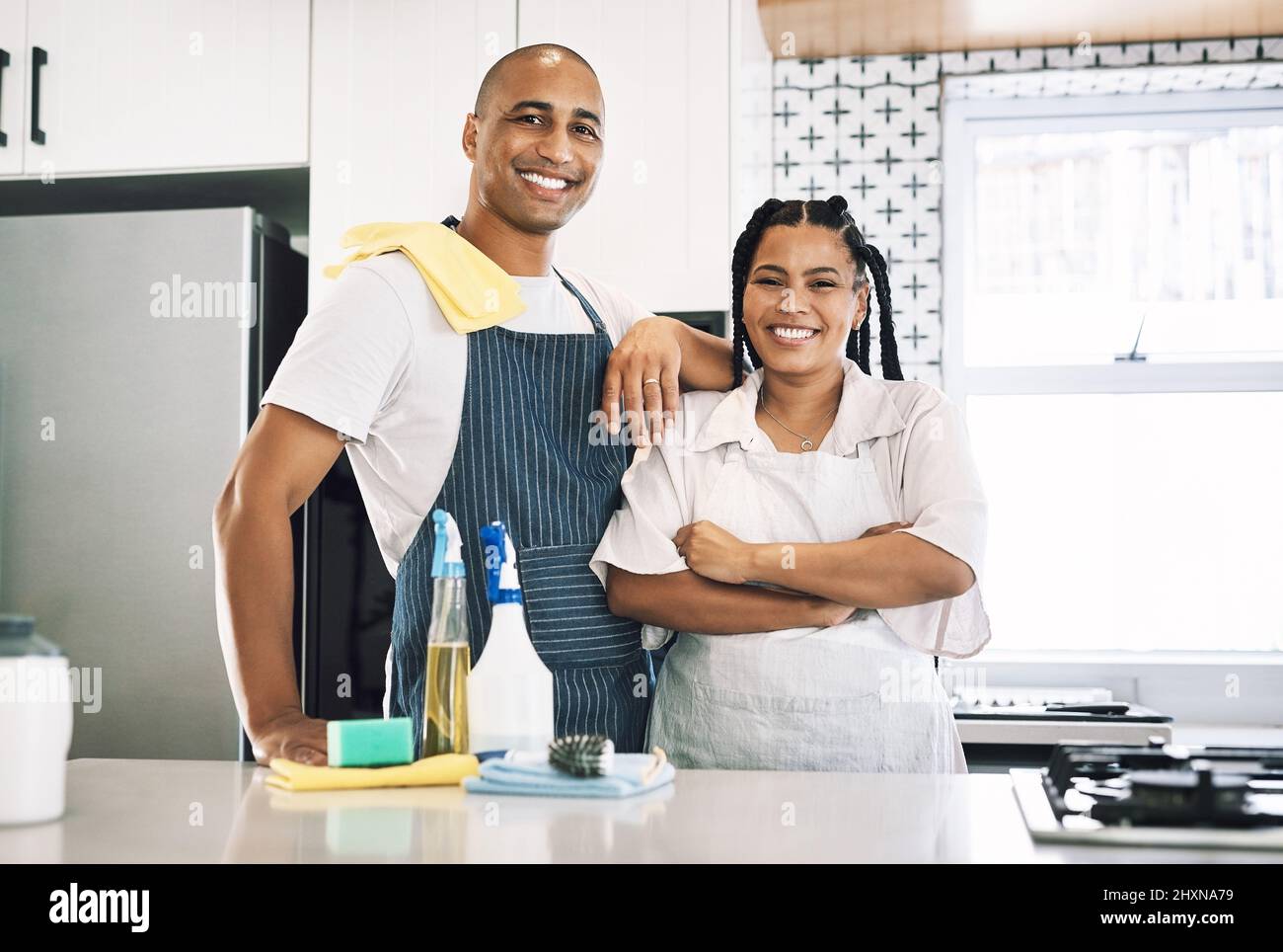 Ethnic couple cleaning house hi-res stock photography and images - Alamy