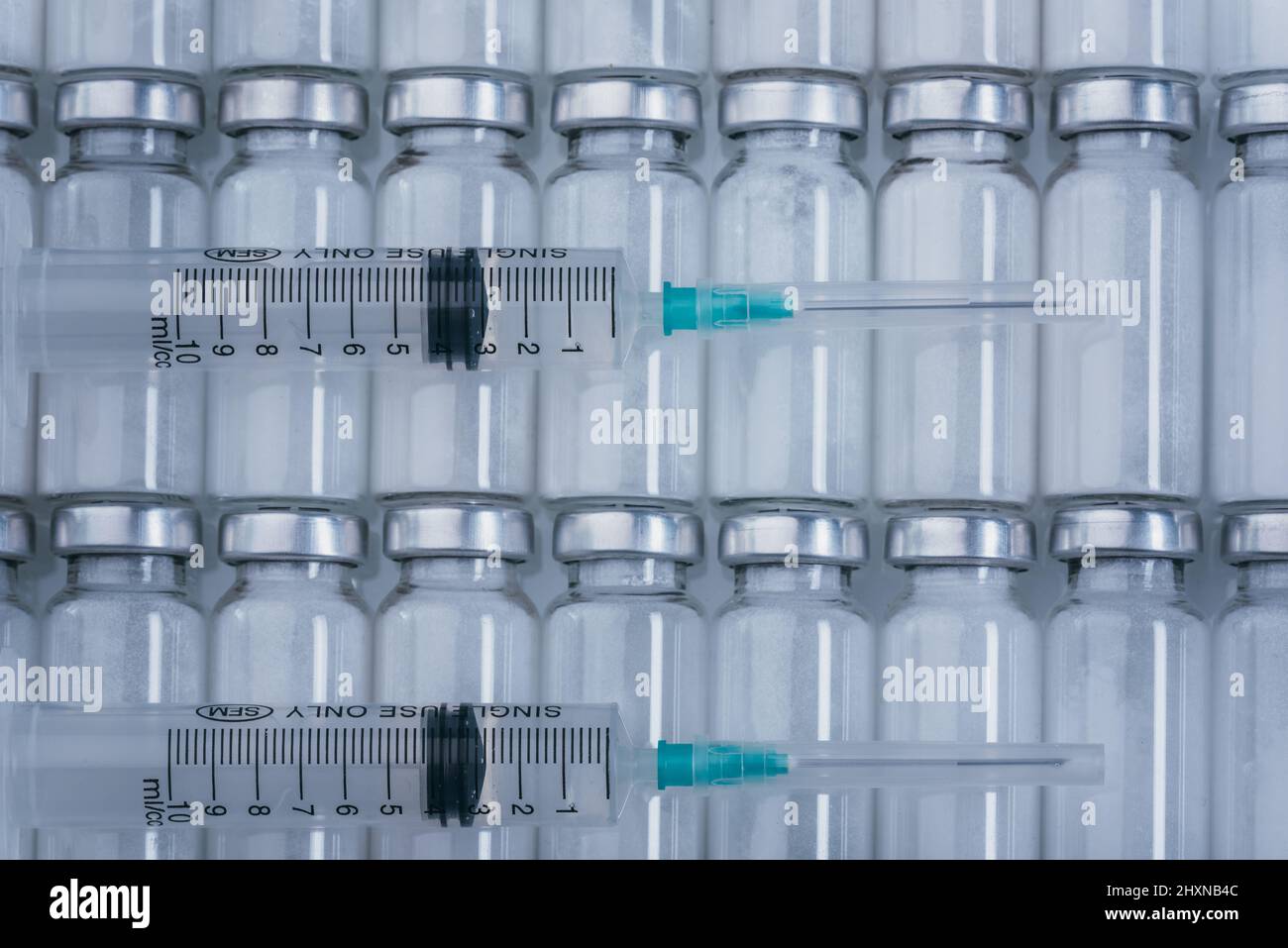 Medicine, Injection, vaccine and disposable syringe, drug concept ...