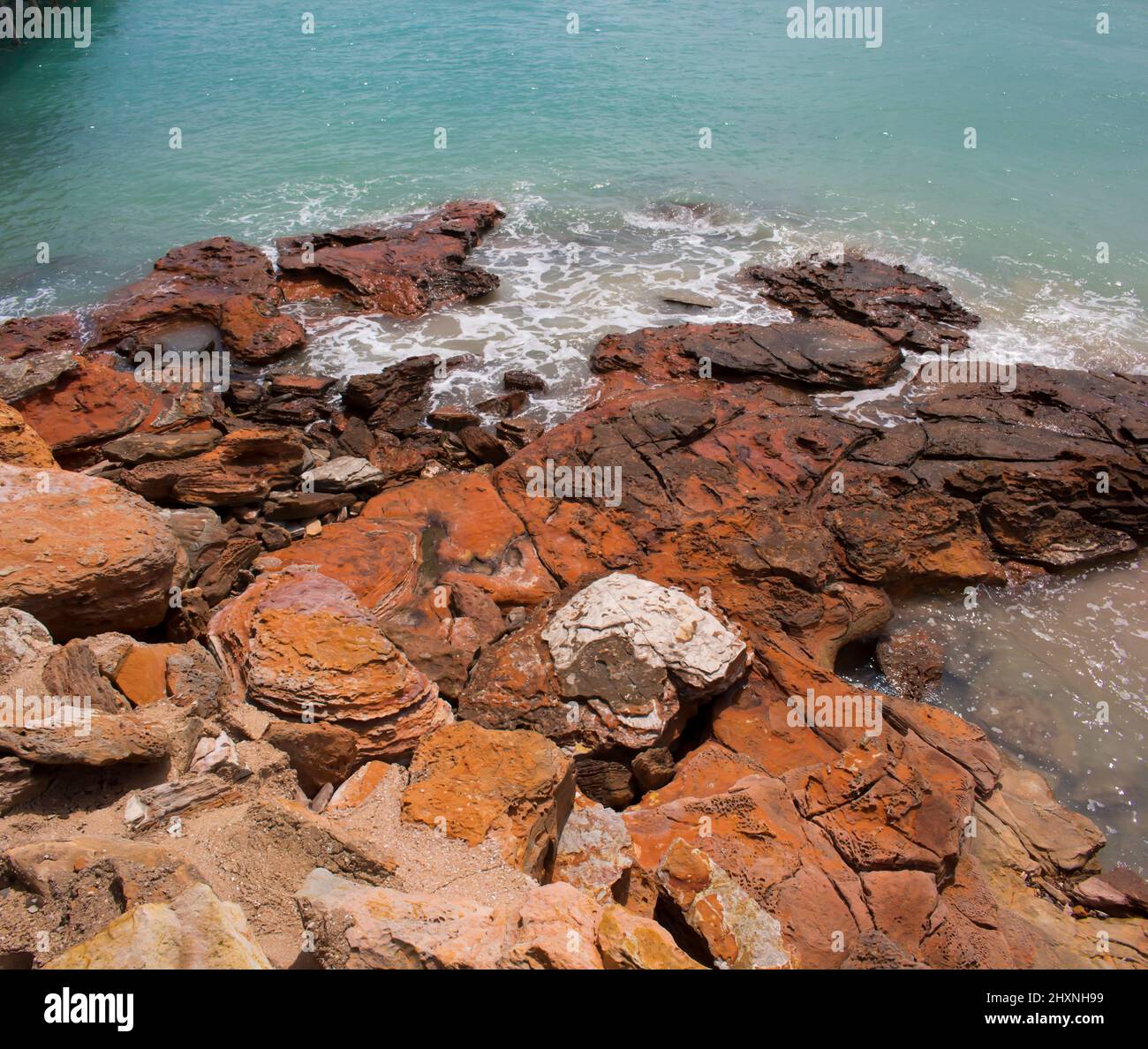Beach rock can be broken into slabs and reworked during storms,forming ...