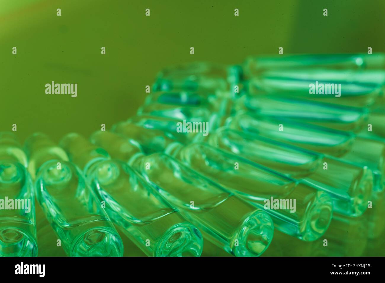 Glass medical ampoule vial for injection. Medicine is liquid sodium ...