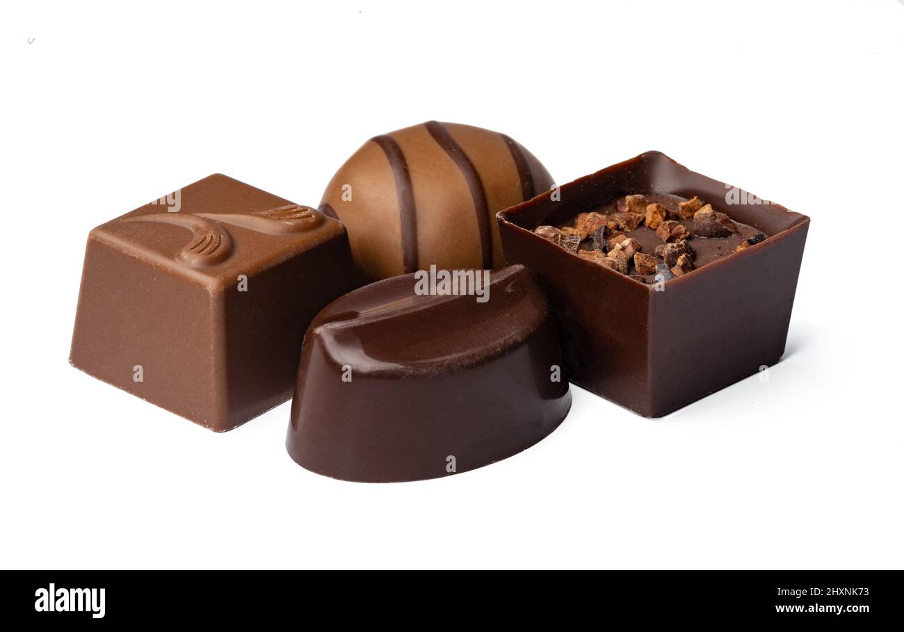 Chocolate sweets on a white background Stock Photo - Alamy