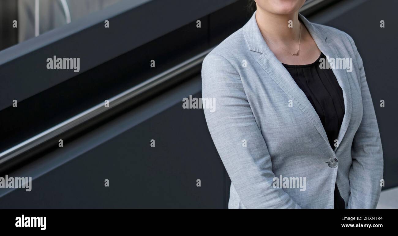 Professional woman in black suit hi-res stock photography and images ...