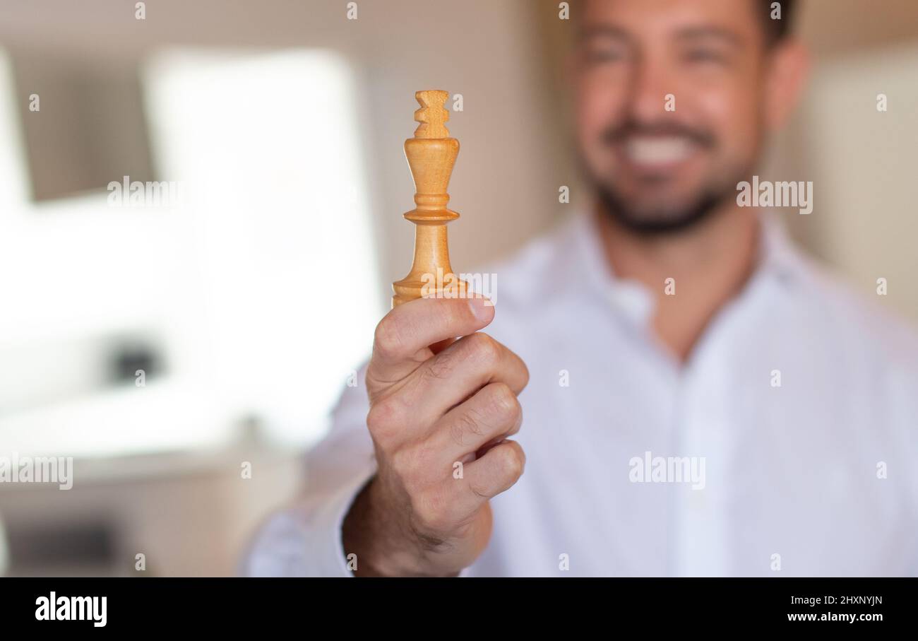 Man holding chess piece people hi-res stock photography and images - Alamy