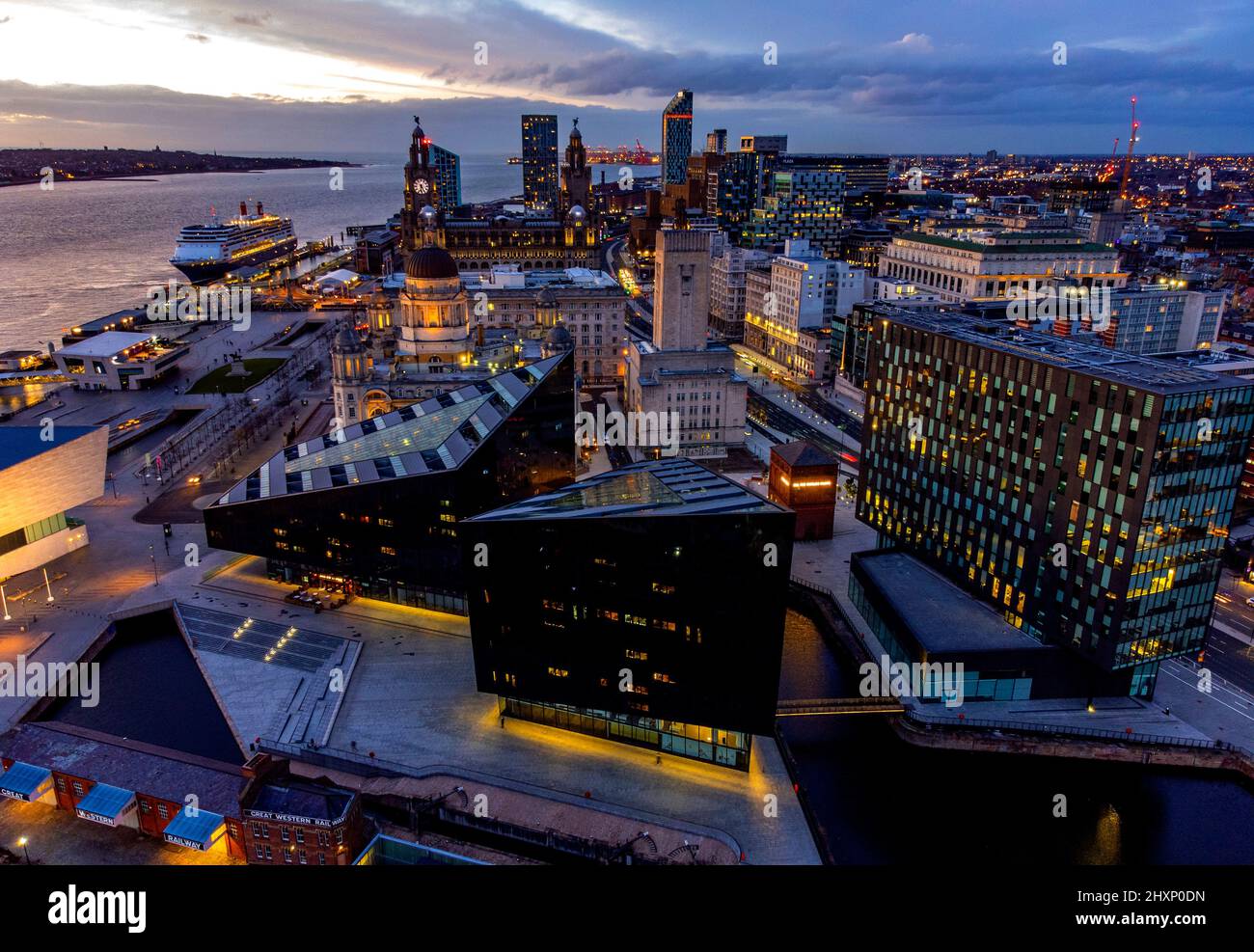 The Borealis cruise liner leaves the port of Liverpool as the sun sets ...