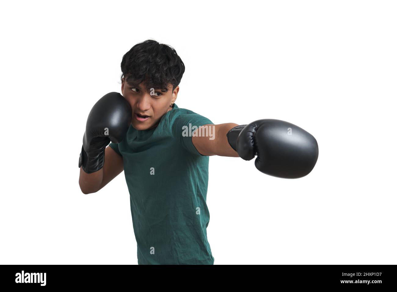 Young peruvian boxer throwing a jab, isolated Stock Photo - Alamy