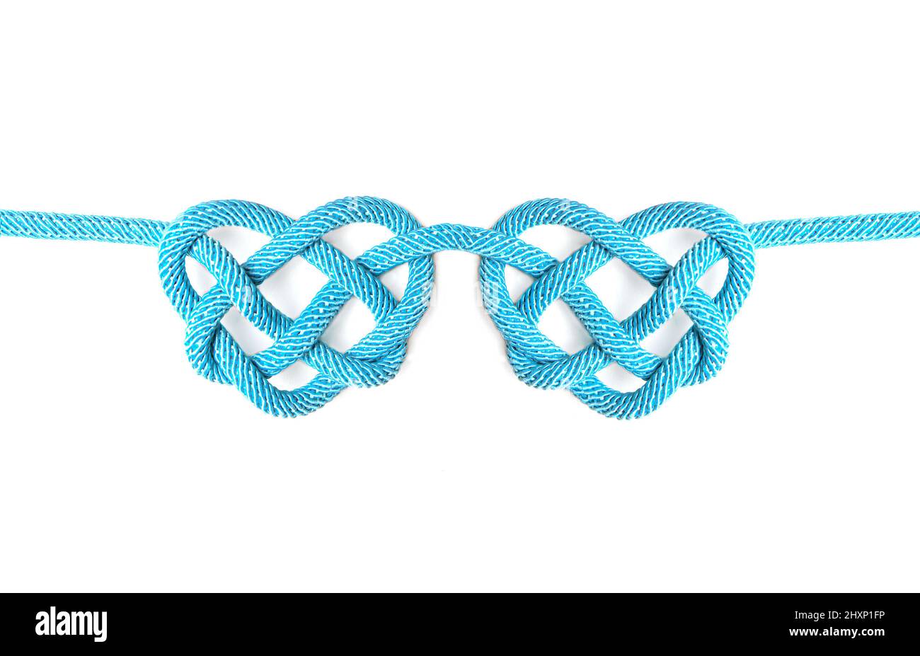 Two blue heart shaped celtic knots isolated on white background ...