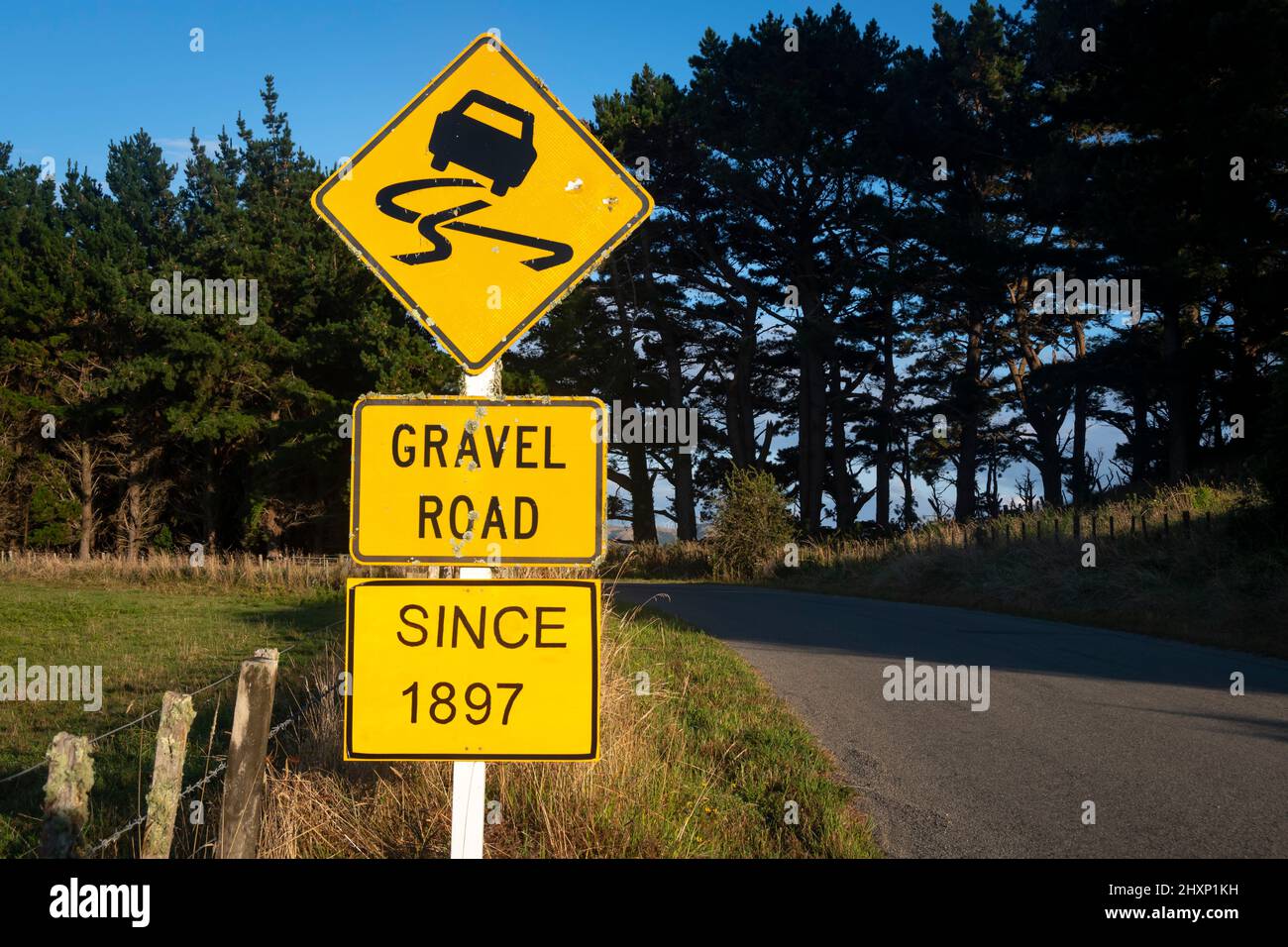 "Gravel road since 1897" sign near Pahiatua, Tararua District, North ...