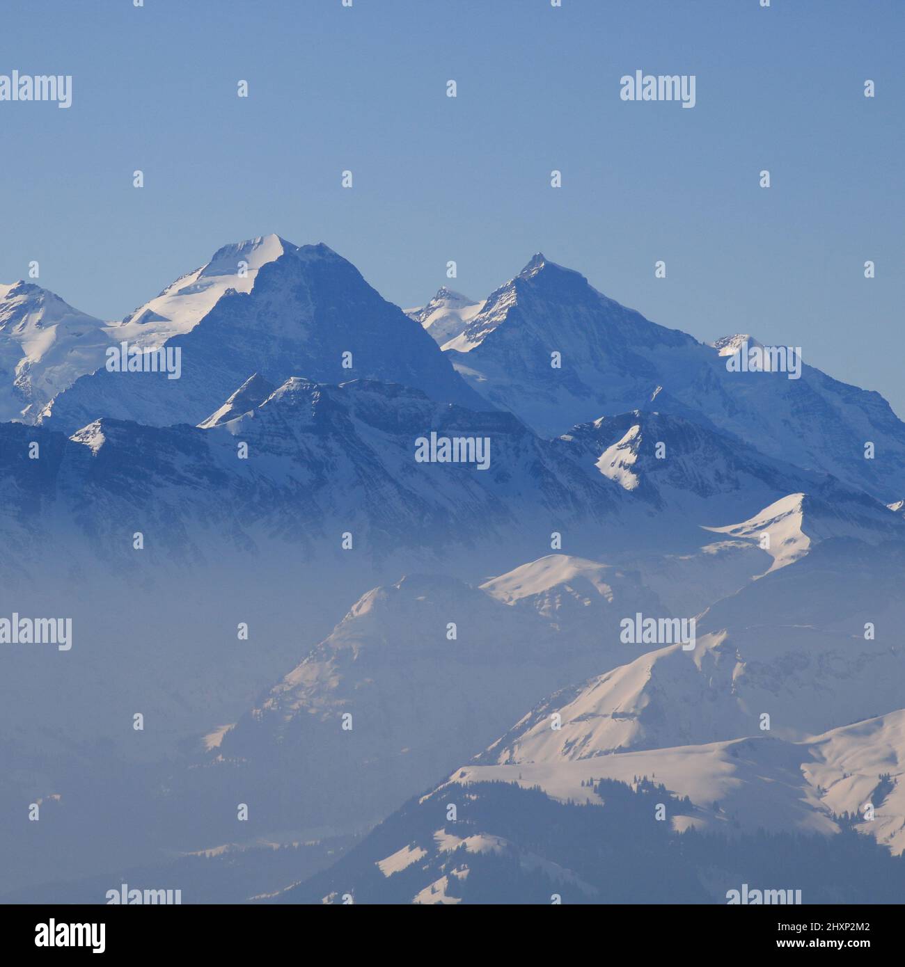 Famous mountain range Eiger, Monch and Jungfrau in winter Stock Photo ...