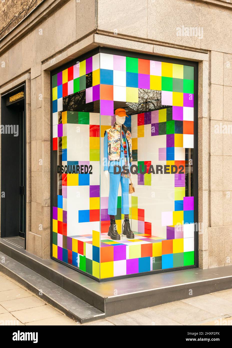 Colourful DSQUARED2 fashion boutique shop corner window display in ...