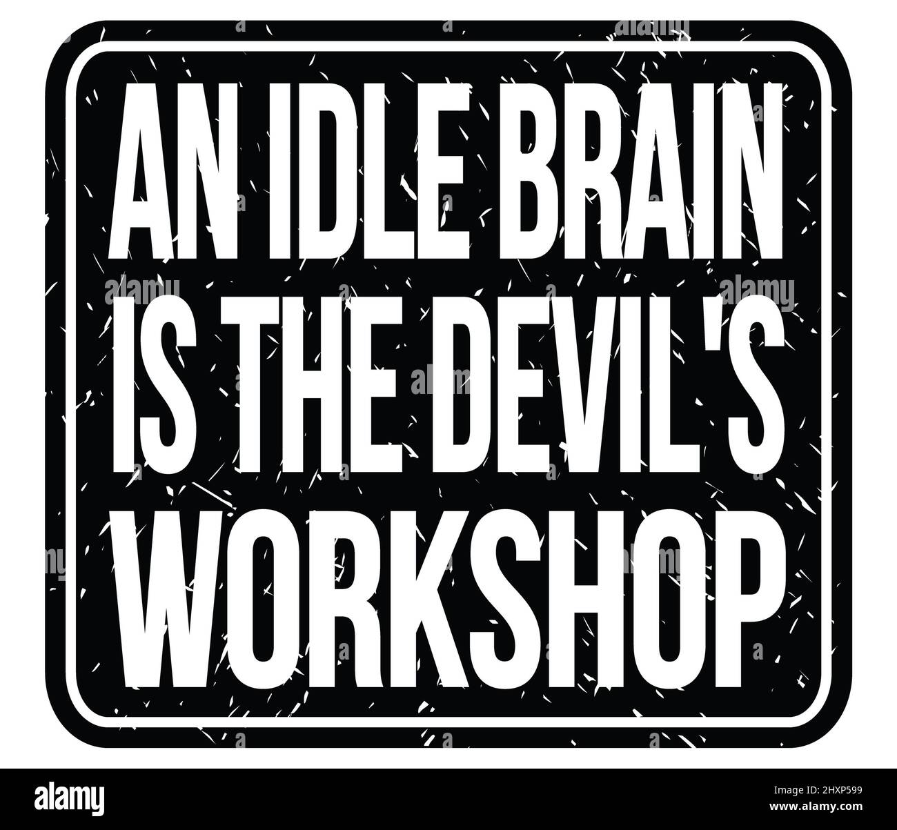 AN IDLE BRAIN IS THE DEVIL'S WORKSHOP, text written on black stamp sign ...