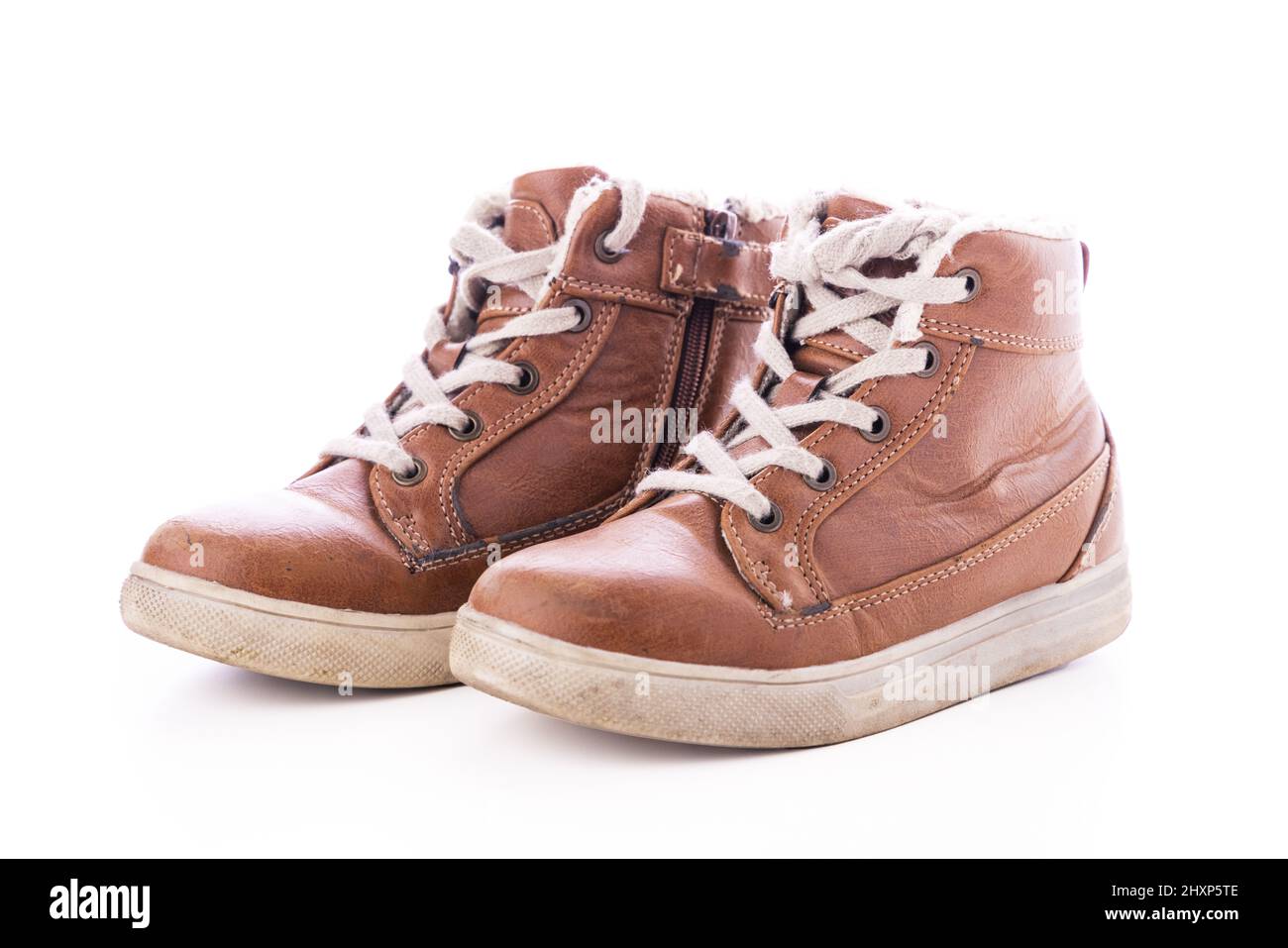 Old & dirty used shoes isolated on white background Stock Photo - Alamy