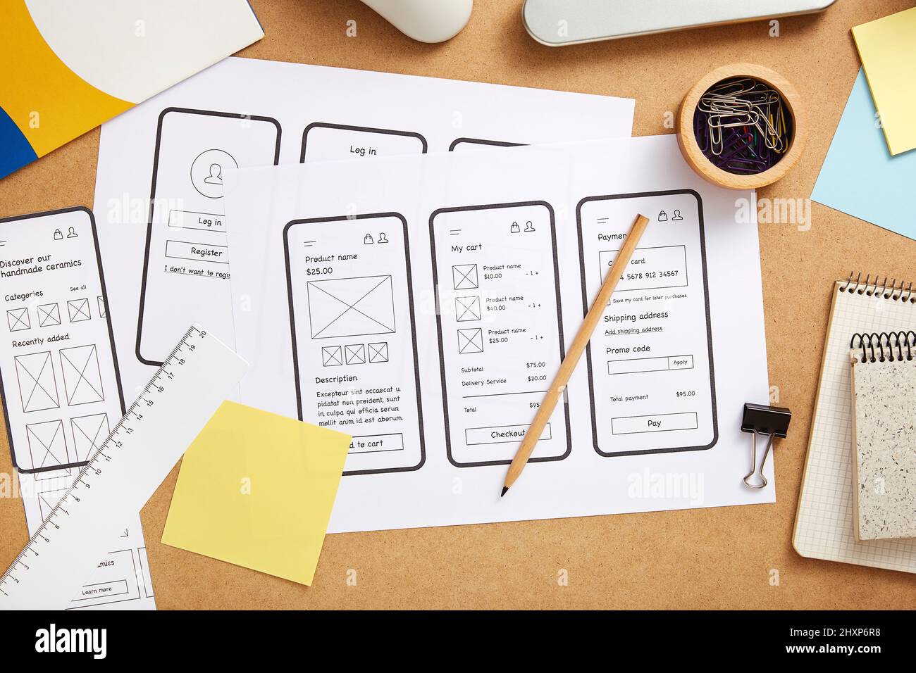 Web design concept. Several mobile app wireframe sketches over product ...