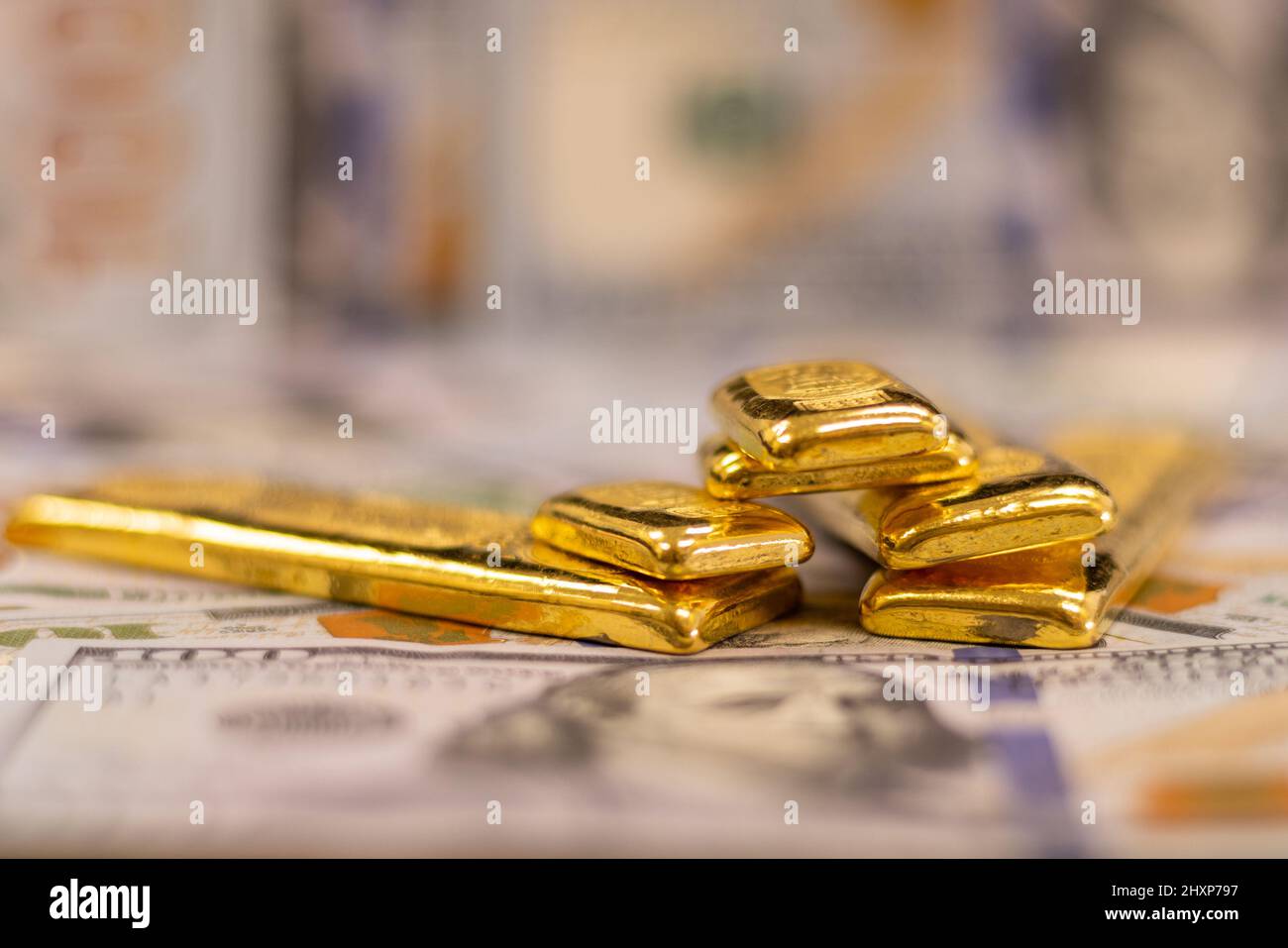 pile of long and short pure gold bars, bullion, ingot on background of ...