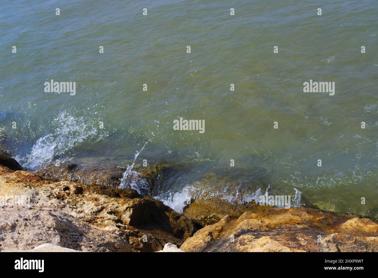 Wave bursting on coastal rocks hi-res stock photography and images - Alamy