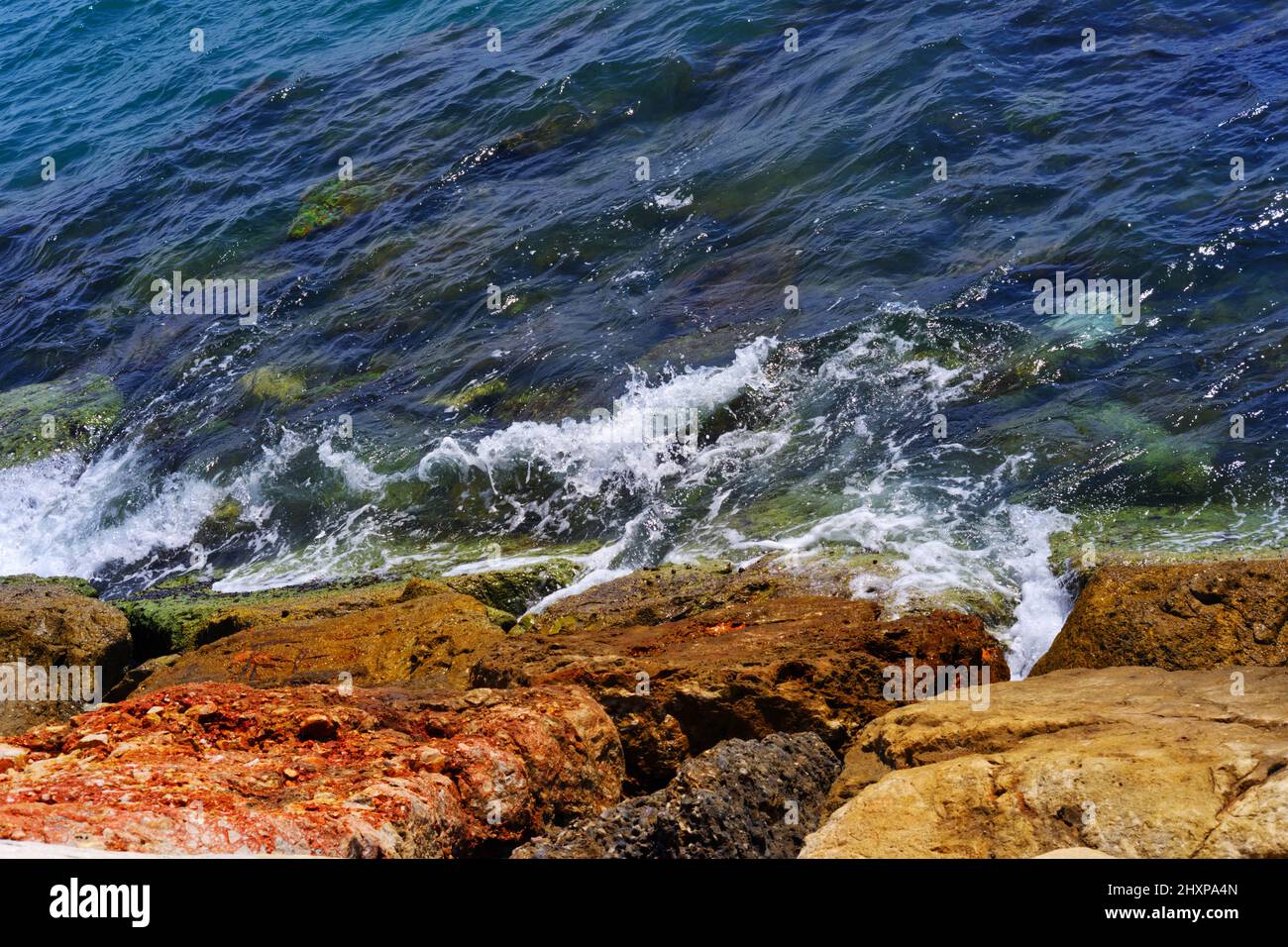 Wave bursting on coastal rocks hi-res stock photography and images - Alamy