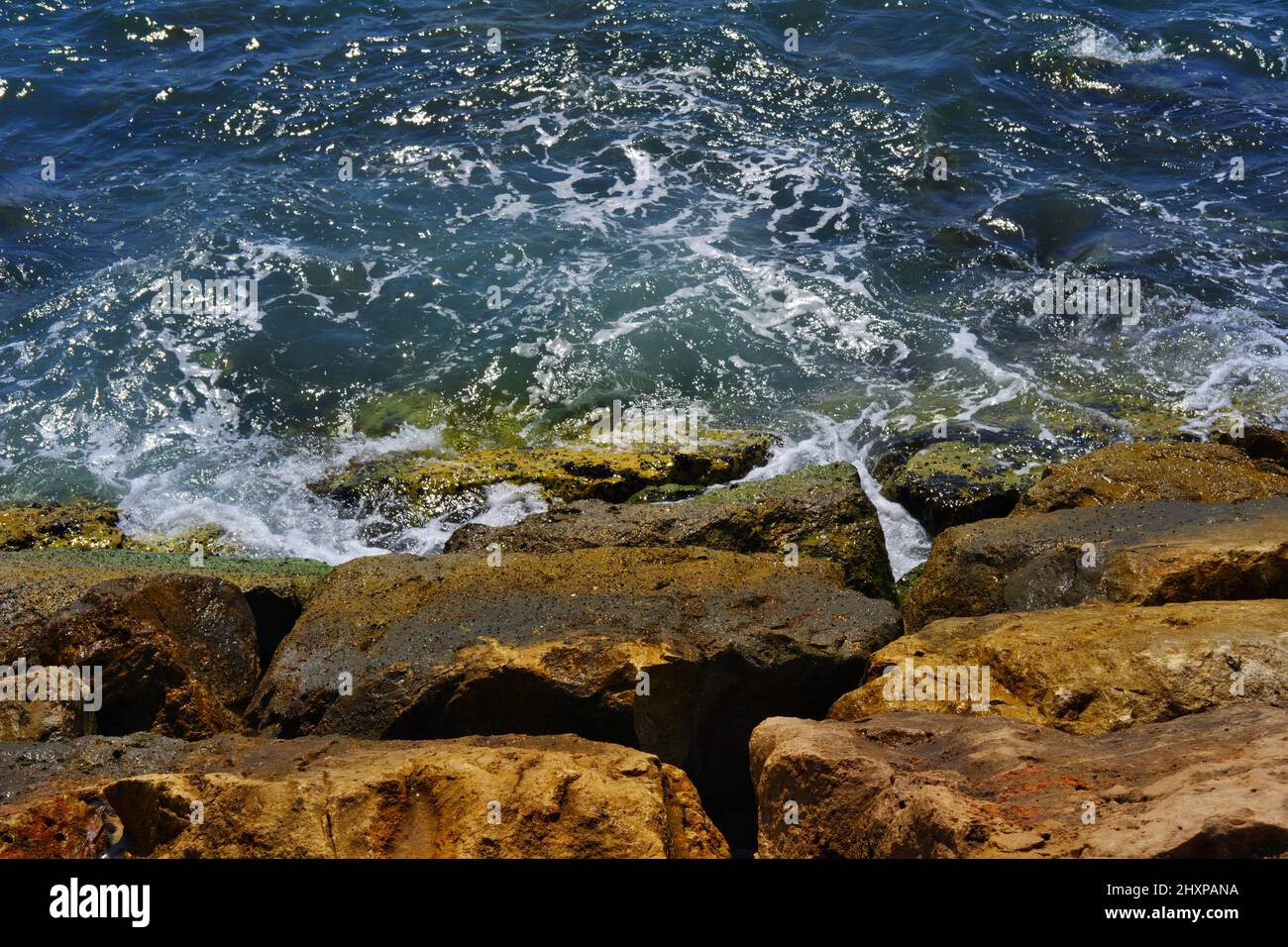 Wave bursting on coastal rocks hi-res stock photography and images - Alamy