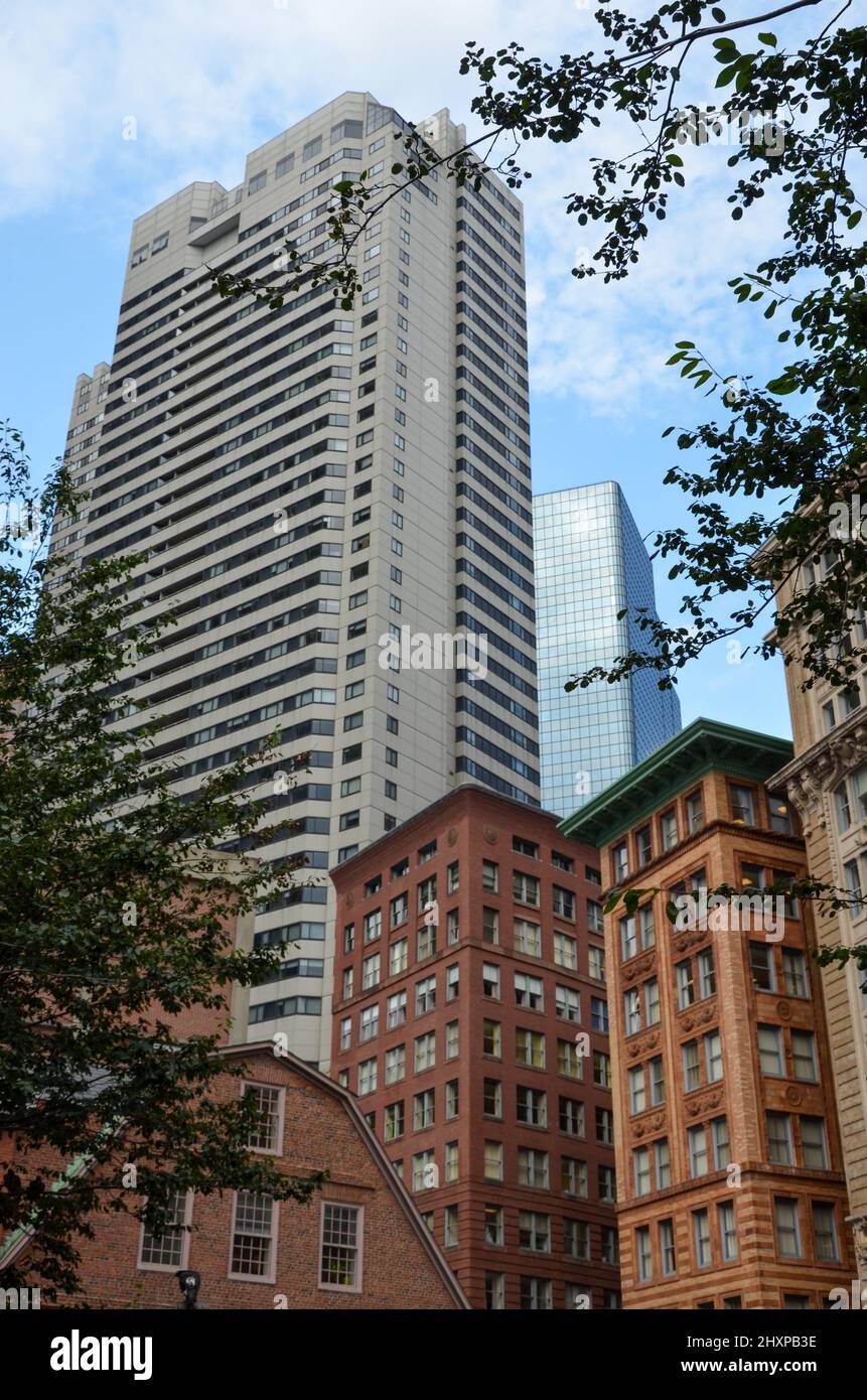 Tall residential building in the middle of Boston between some red ...