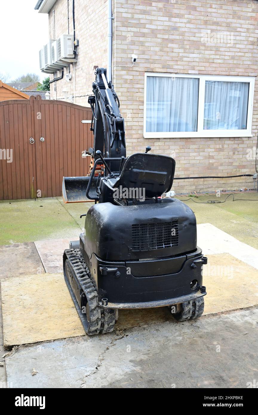 A small garden digger parked ready for use Stock Photo - Alamy