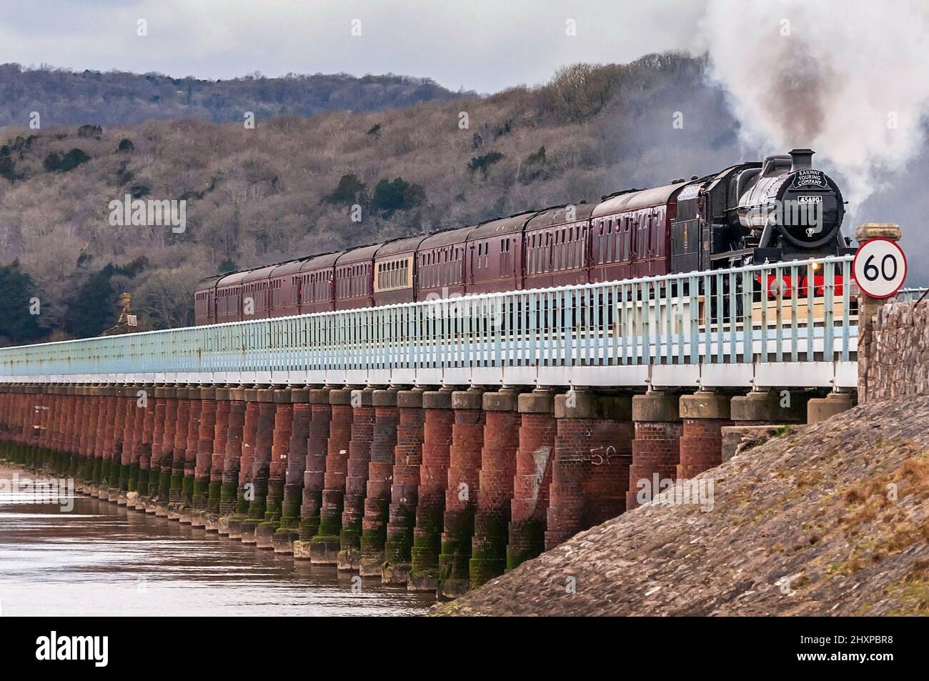 Restored steam engine Leander crossing the Arnside viaduct over the ...