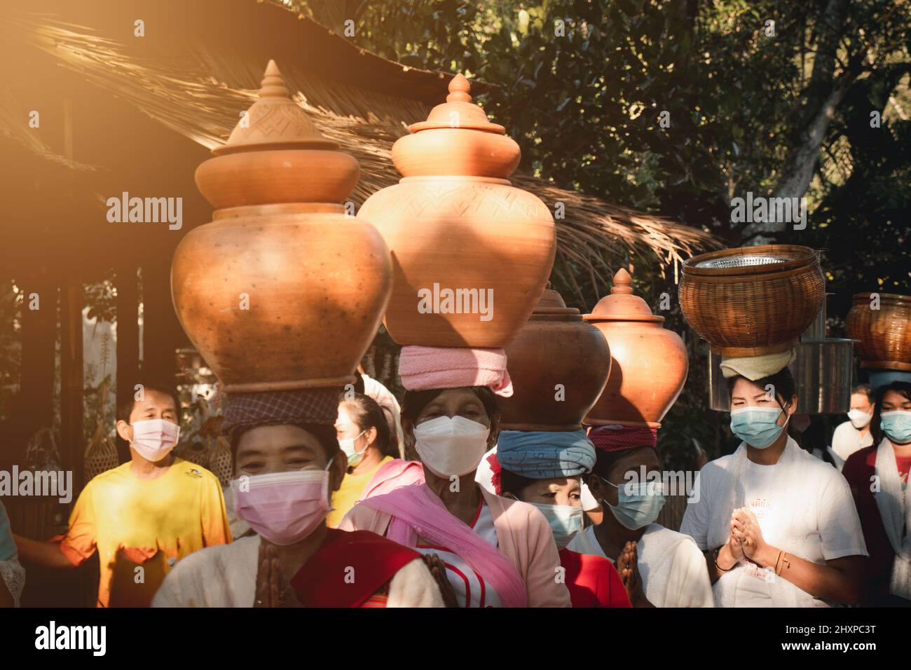 The tradition of offering alms to monks and the way of life of the Mon ...