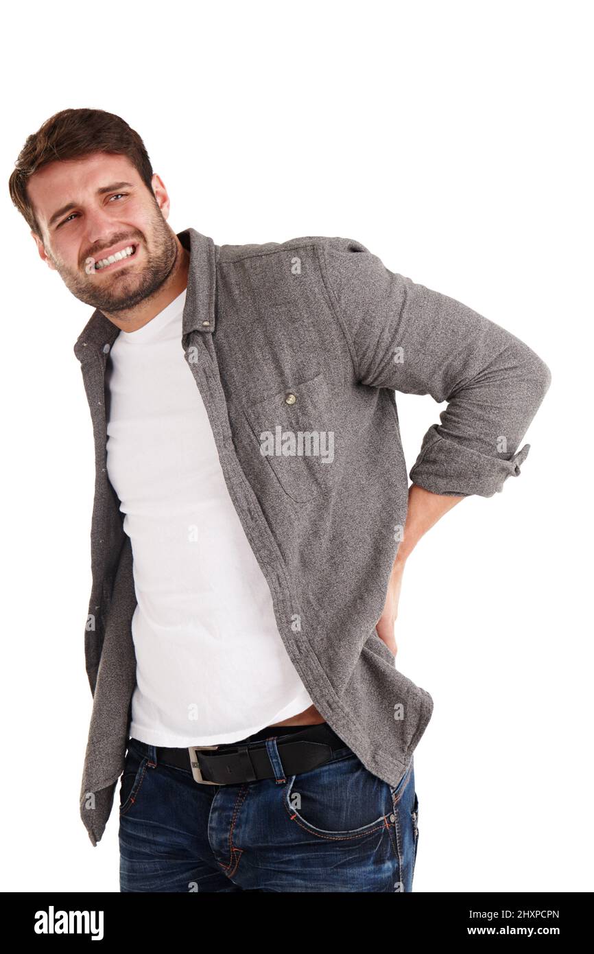 Dont let back pain get the better of you. Studio shot of a young man ...