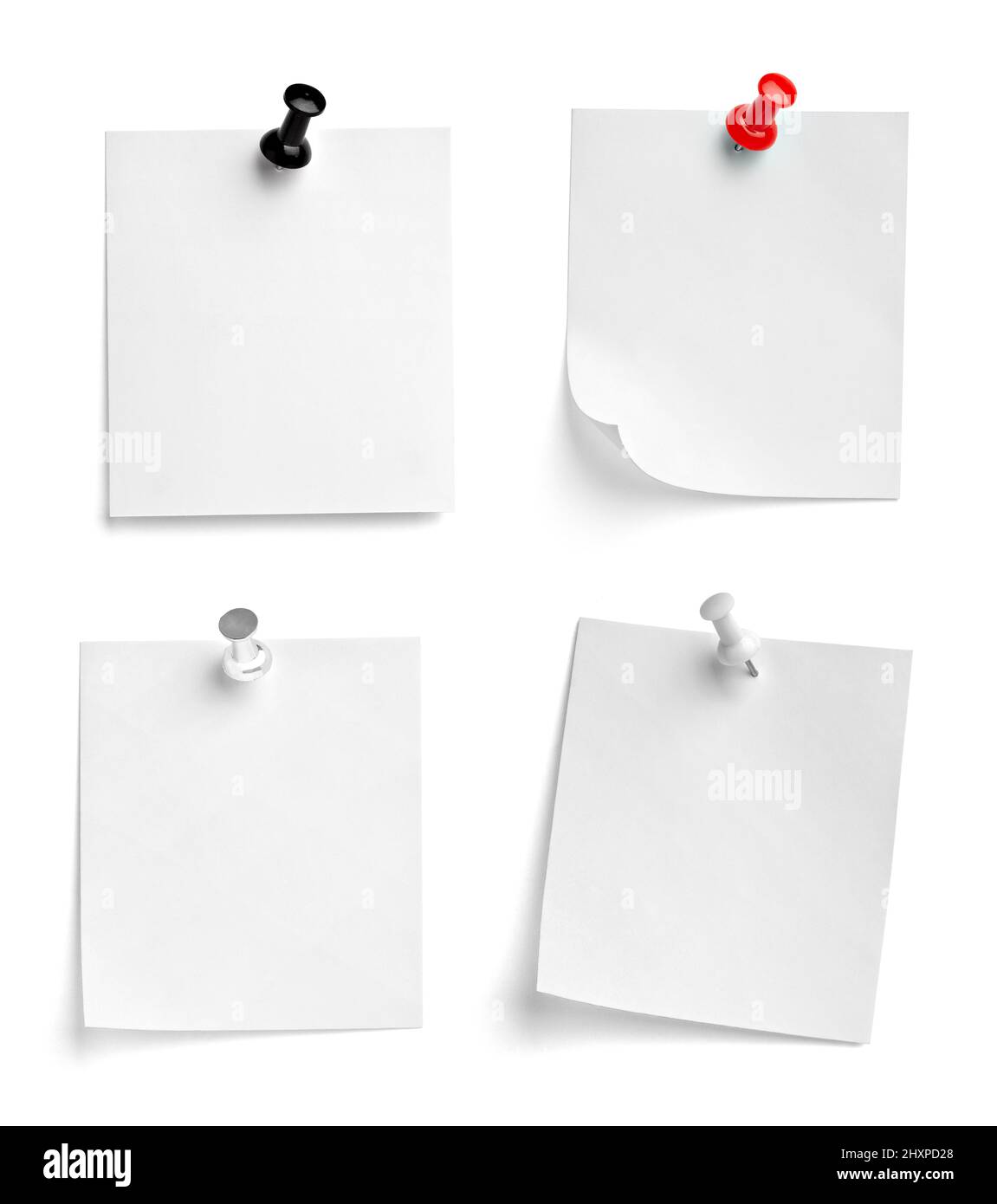 collection of various note paper with a push pin on white background ...