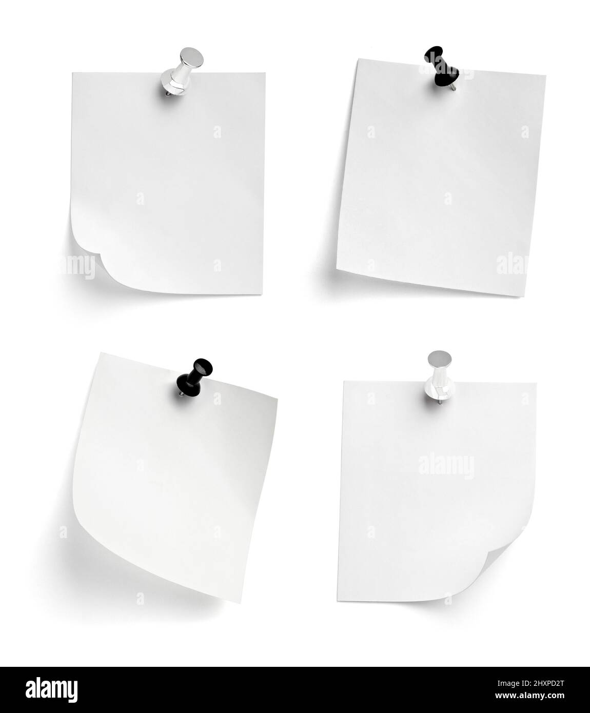 collection of various note paper with a push pin on white background ...